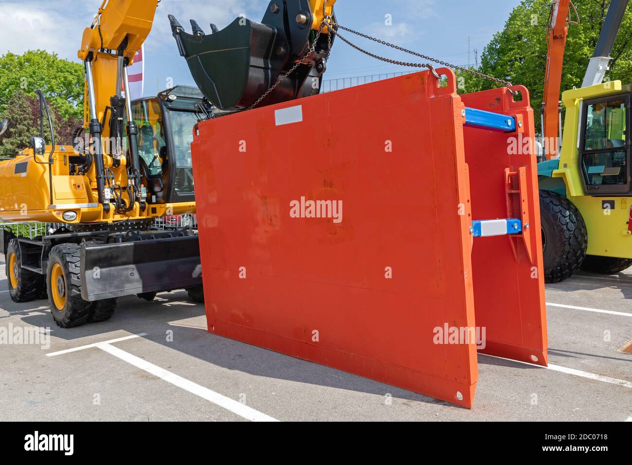Digger Moving Fondation Forms at Construction Site Stock Photo - Alamy