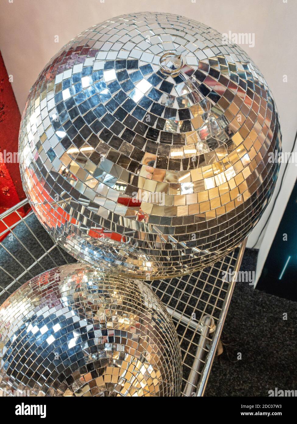Big Retro Disco Ball in Shopping Cart Stock Photo - Alamy