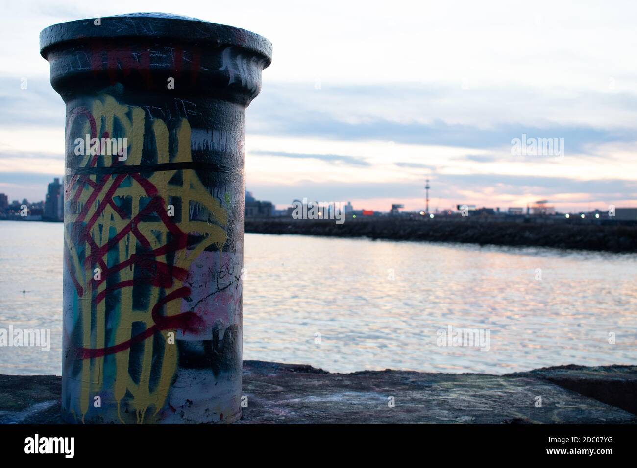 A Graffiti Tagged Pole at Graffiti Pier With the Philadelphia Skyline ...