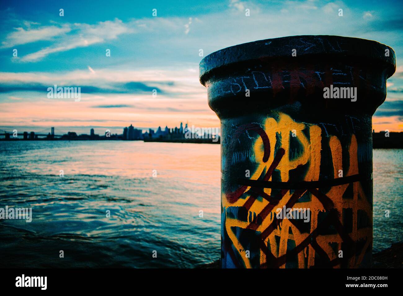 A Graffiti Tagged Pole at Graffiti Pier With the Philadelphia Skyline ...
