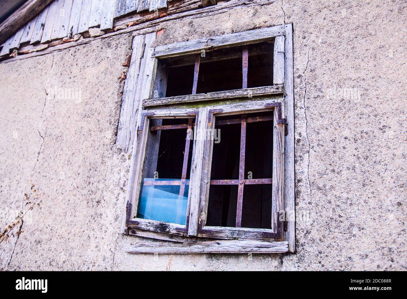 Wooden retro window on the old abandoned rural house Stock Photo - Alamy