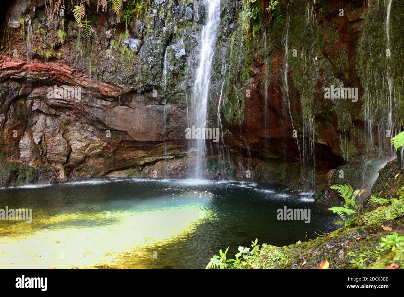 The famous waterfall 25 Fontes with a lot of natural springs. Madeira ...