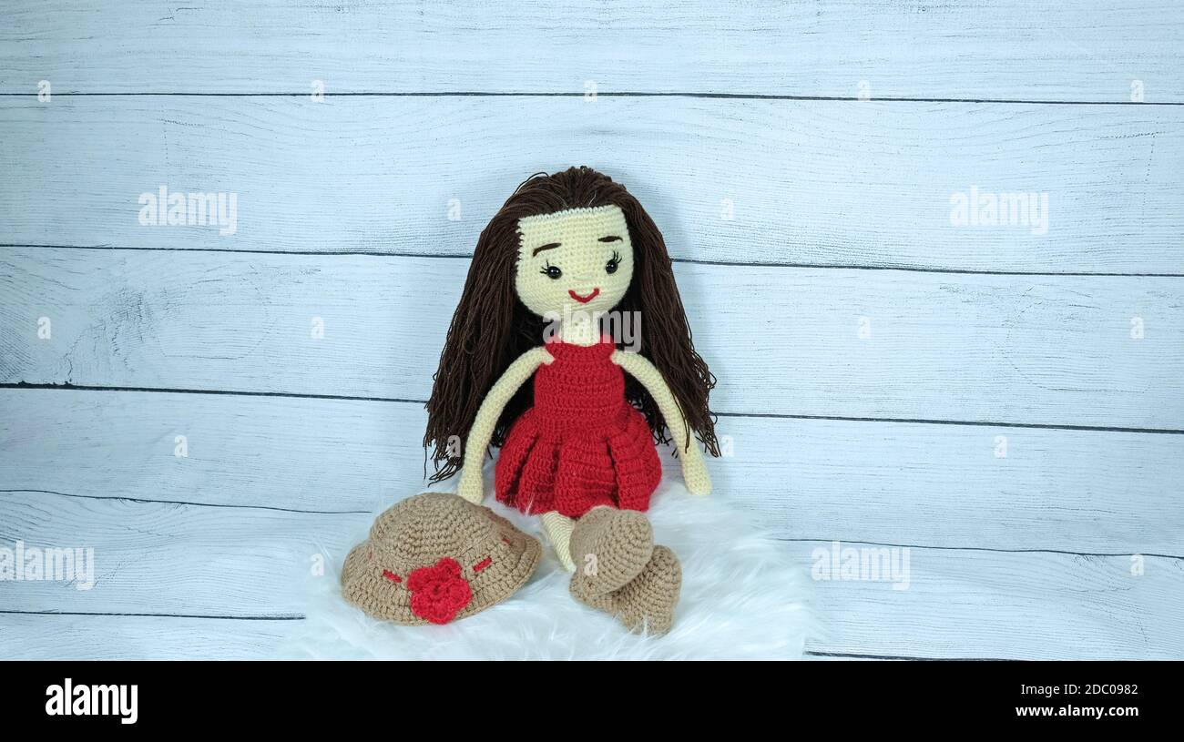 Amigurumi doll on the white rug Stock Photo - Alamy