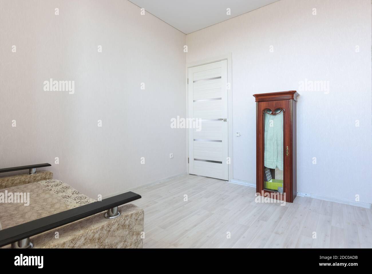 The interior of a modest small bedroom with very poor furniture Stock ...