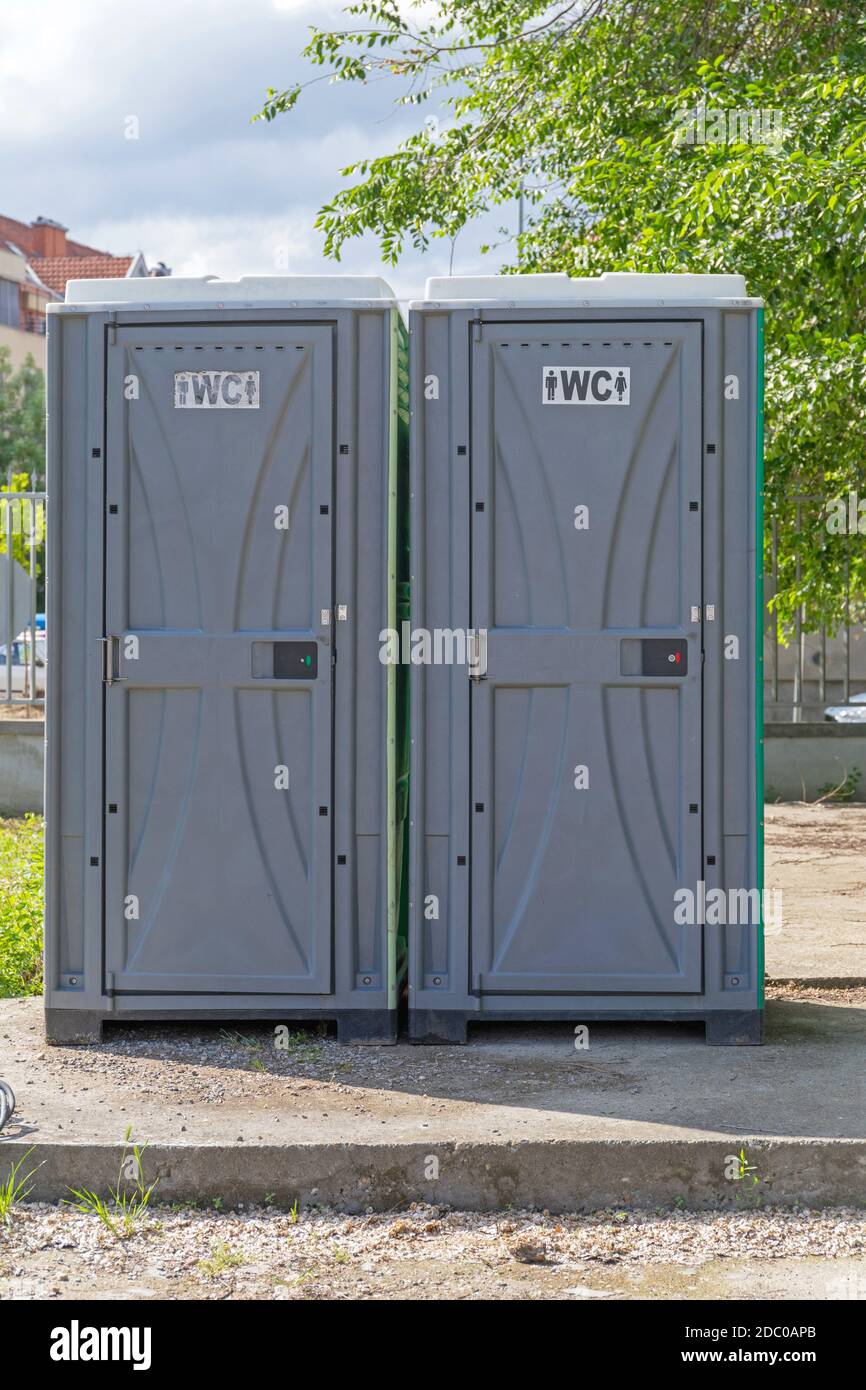 Two Plastic Cabins Chemical Toilets at Festival Stock Photo - Alamy
