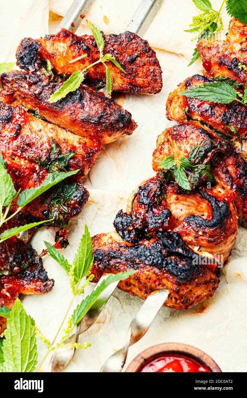 Kebab on skewers with nettle marinade.Meat on skewers,barbecue Stock ...