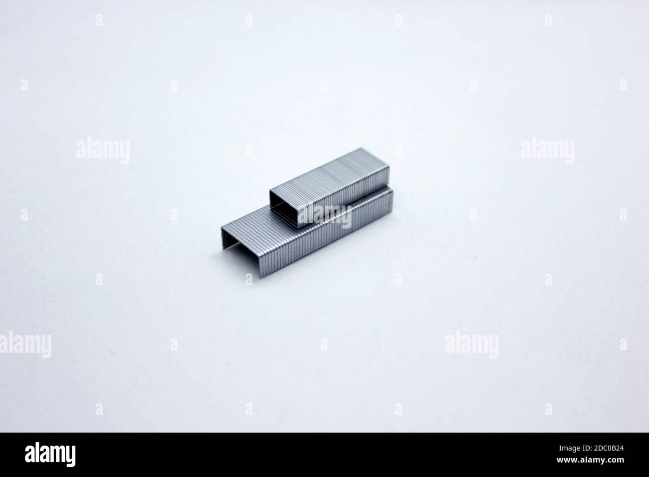 Metal staples for stapler isolated on white background Stock Photo - Alamy
