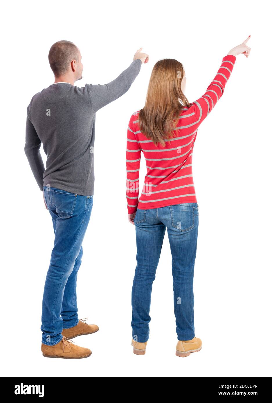 Back view of couple in sweater pointing. Rear view people collection ...