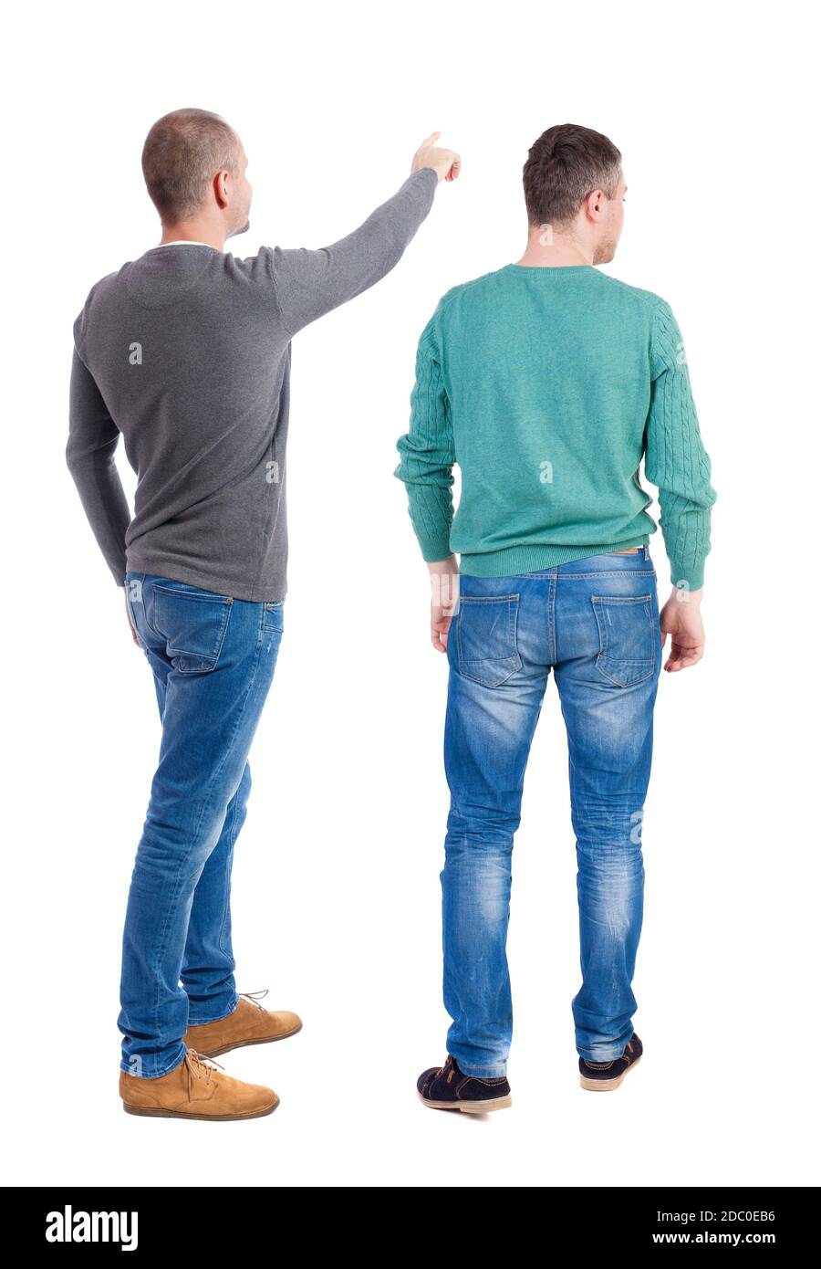 Back view of two man in sweater pointing. Rear view people collection ...