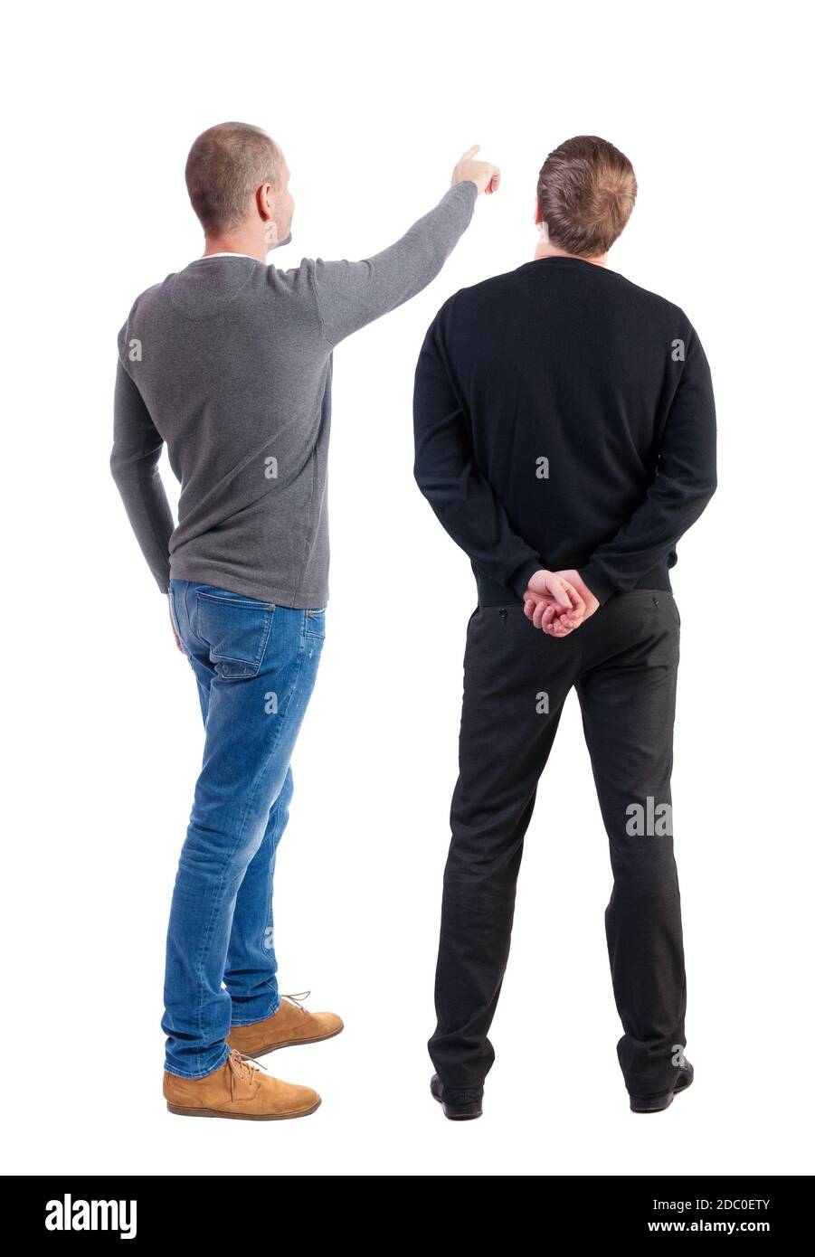 Back view of two man in sweater pointing. Rear view people collection ...