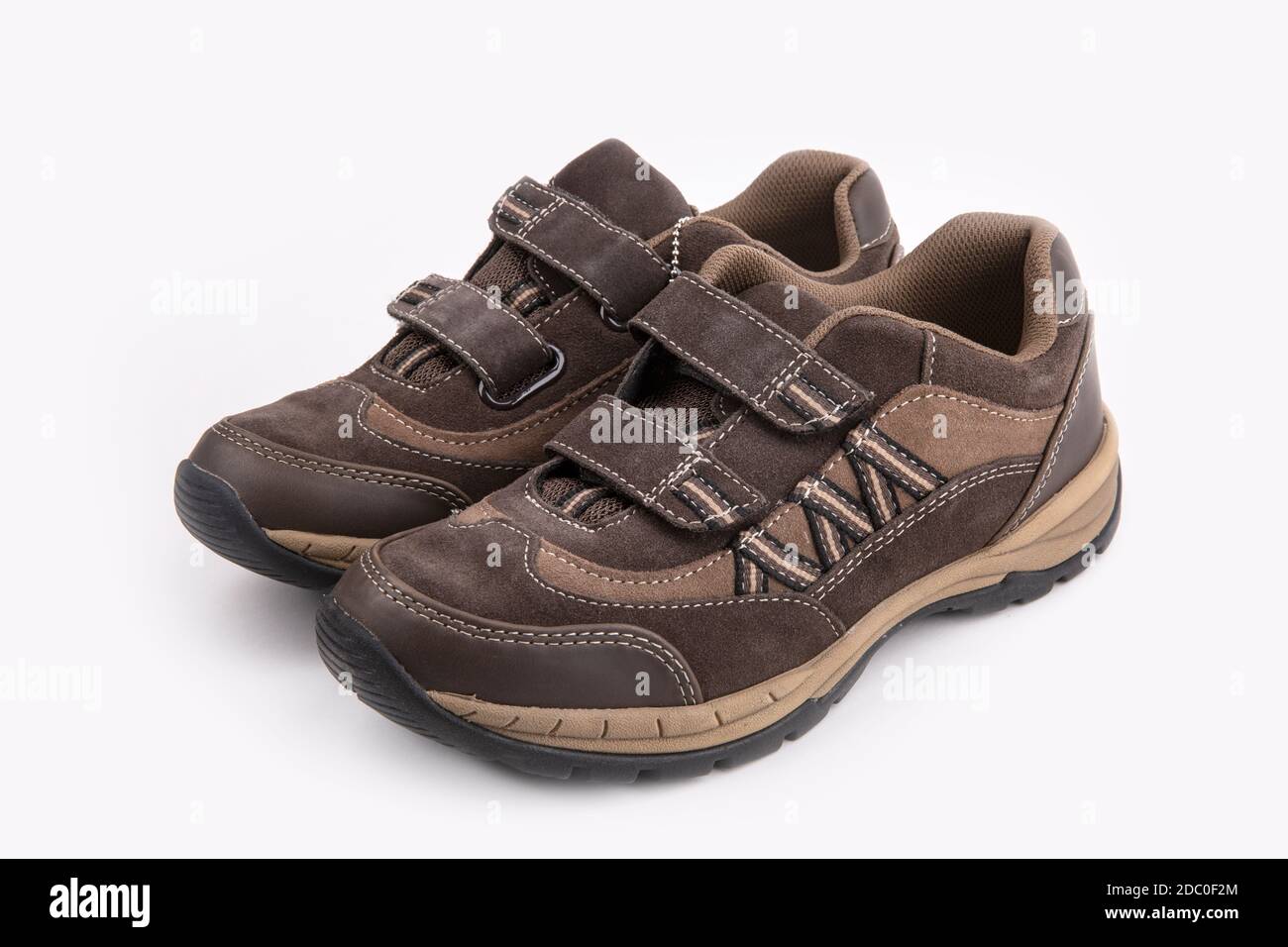 Brown Buckskin hook-and-loop fastener shoe on white background Stock ...