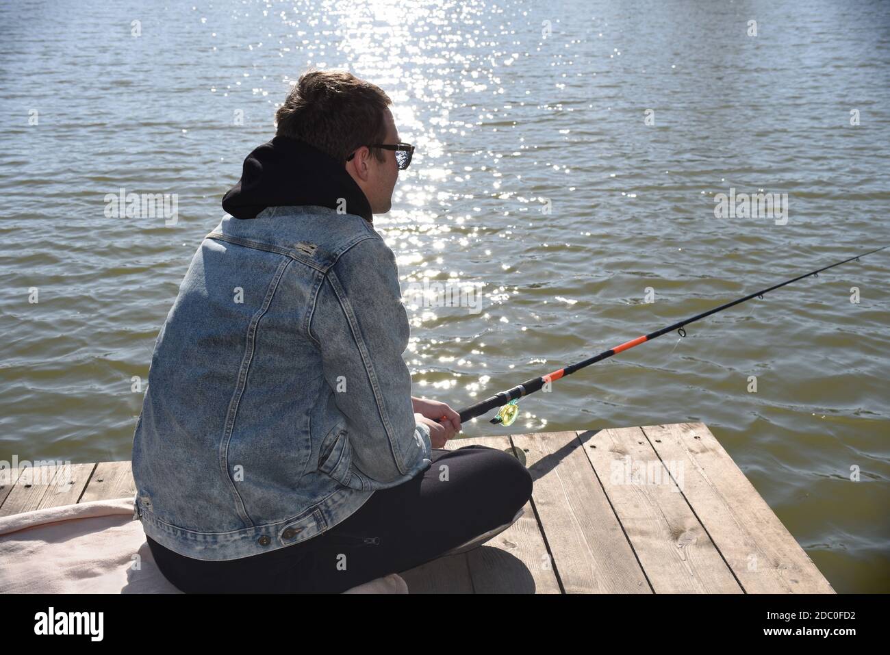 Person looking at lake fish hi-res stock photography and images - Alamy