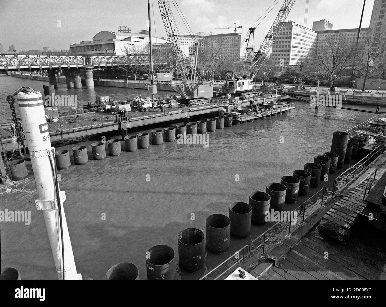 1997, Construction works on the river Thames at Hungerford Bridge, City ...