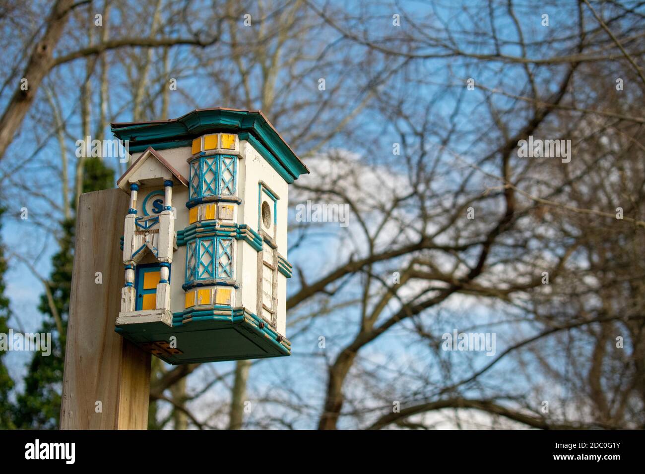 A Colorful and Detailed Birdhouse Made to Look Like a Real House Stock ...