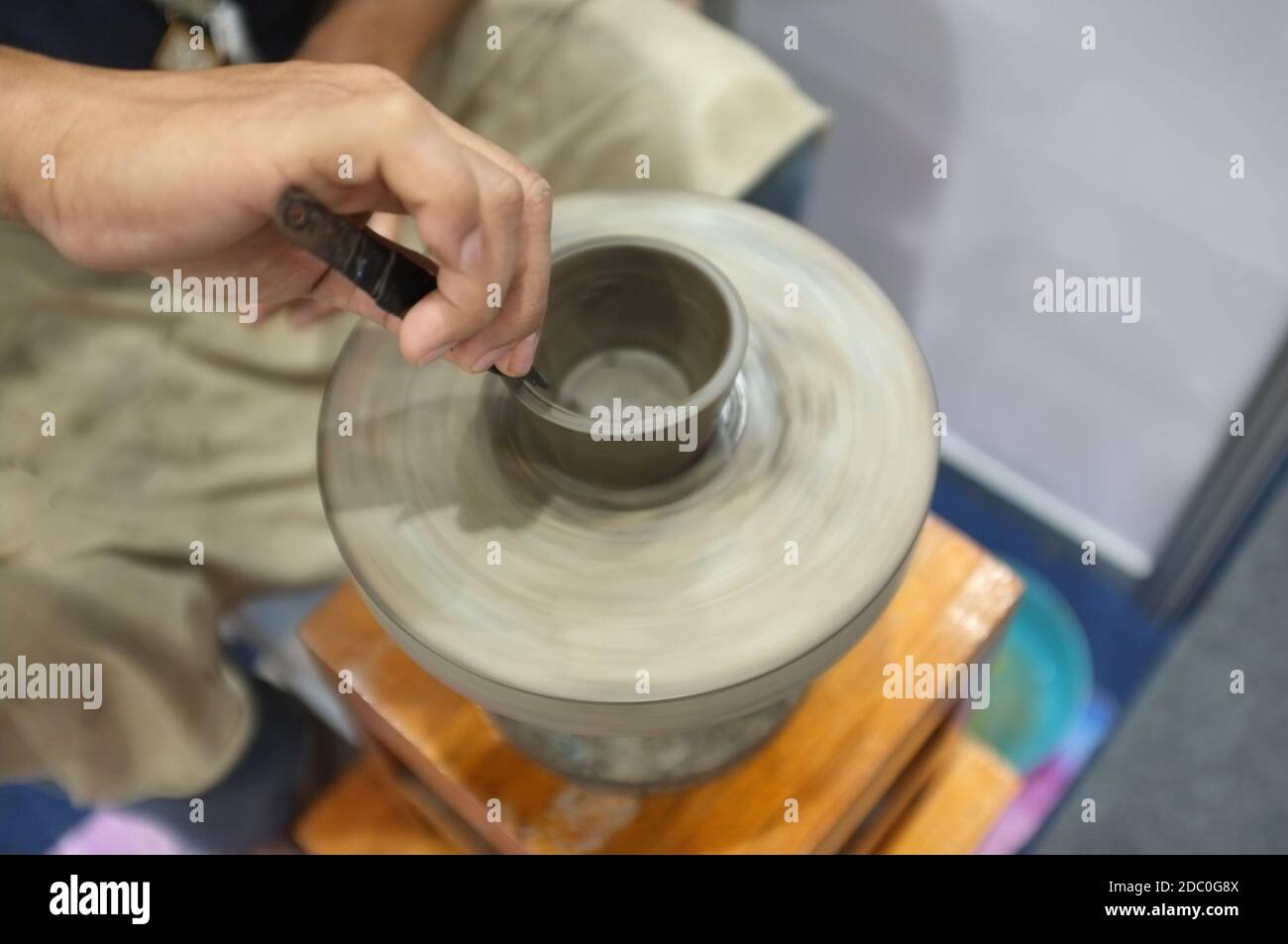 Concept Ceramic workshop. The man Throwing clay bowl on a pottery's ...