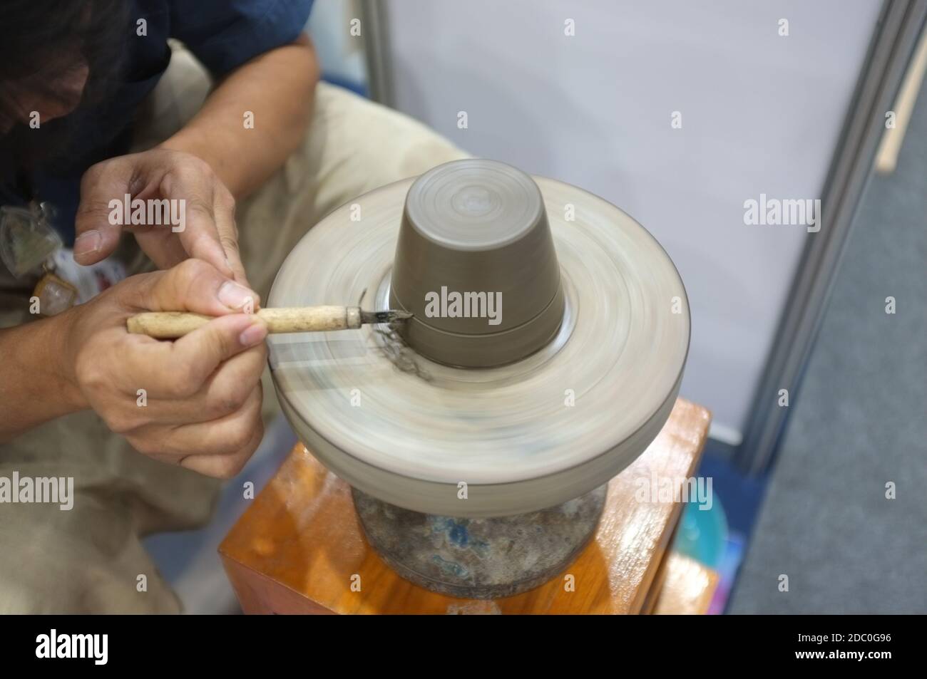 Concept Ceramic workshop. The man Throwing clay bowl on a pottery's ...
