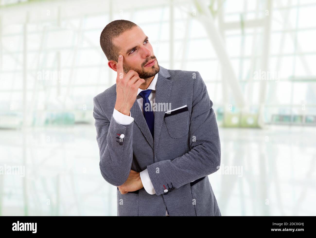young business man thinking at the office Stock Photo - Alamy