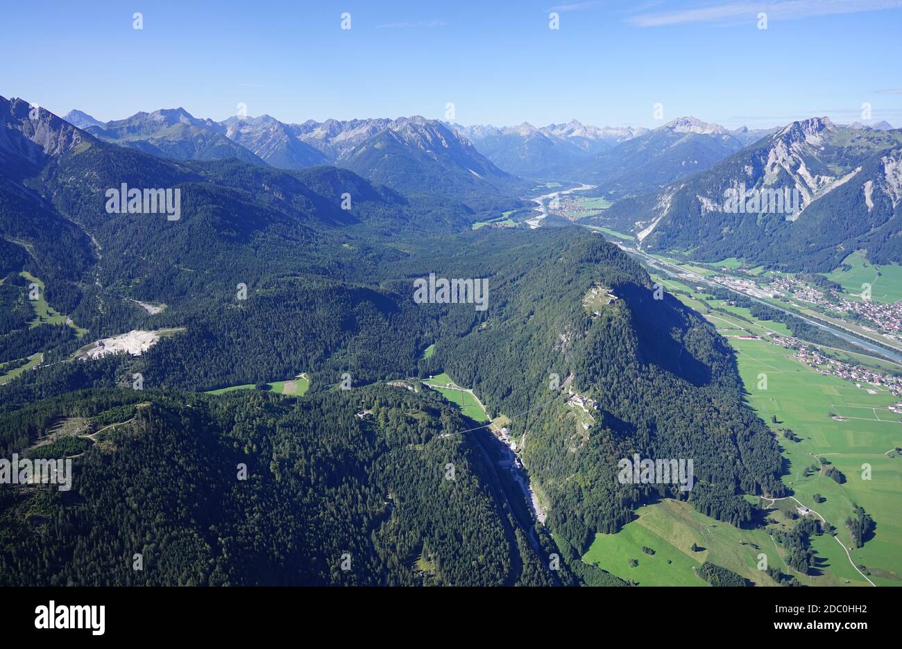 Aerial view of valleys and mountains near Reutte in Tyrol / Austria ...