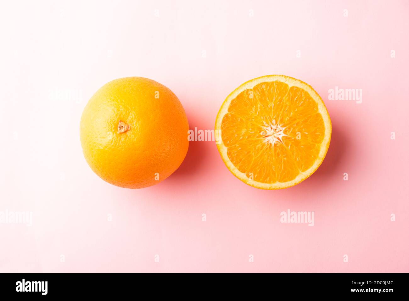 Top view of Fresh half orange fruit slice and full orange in the studio ...