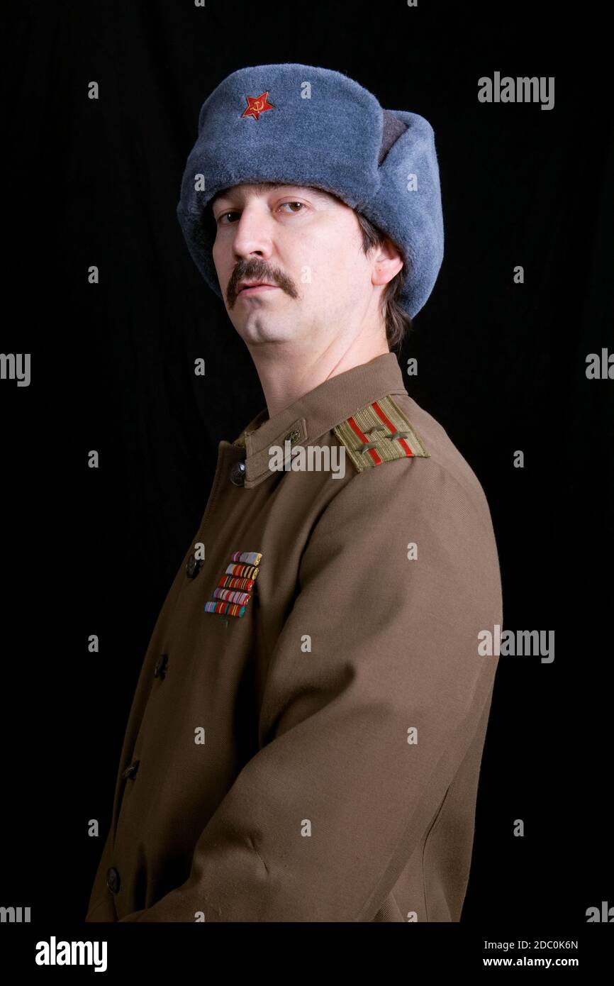 young man dressed as russian military, studio Stock Photo - Alamy