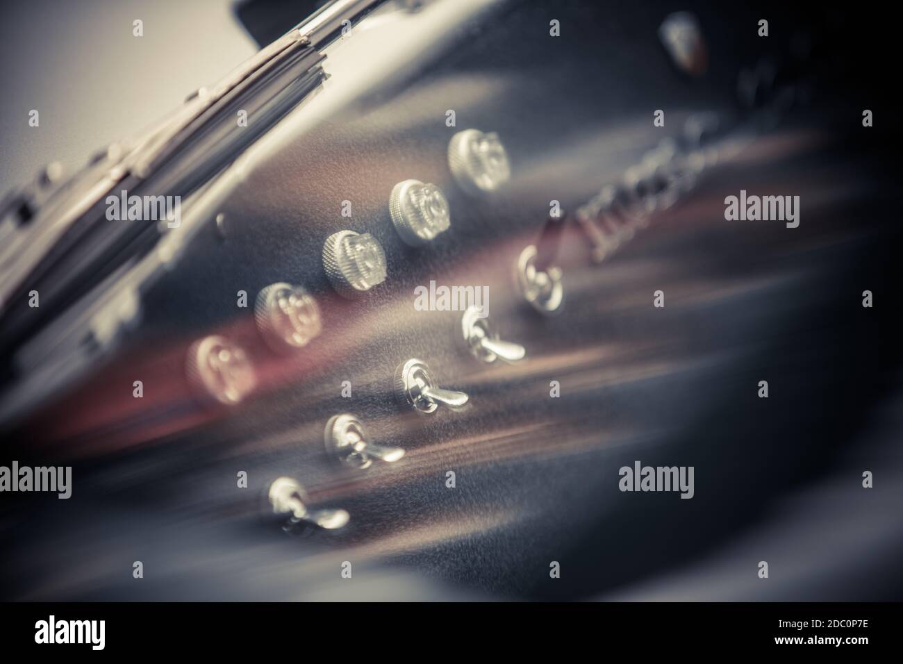 Color close up shot of buttons and switches on a vintage car's ...