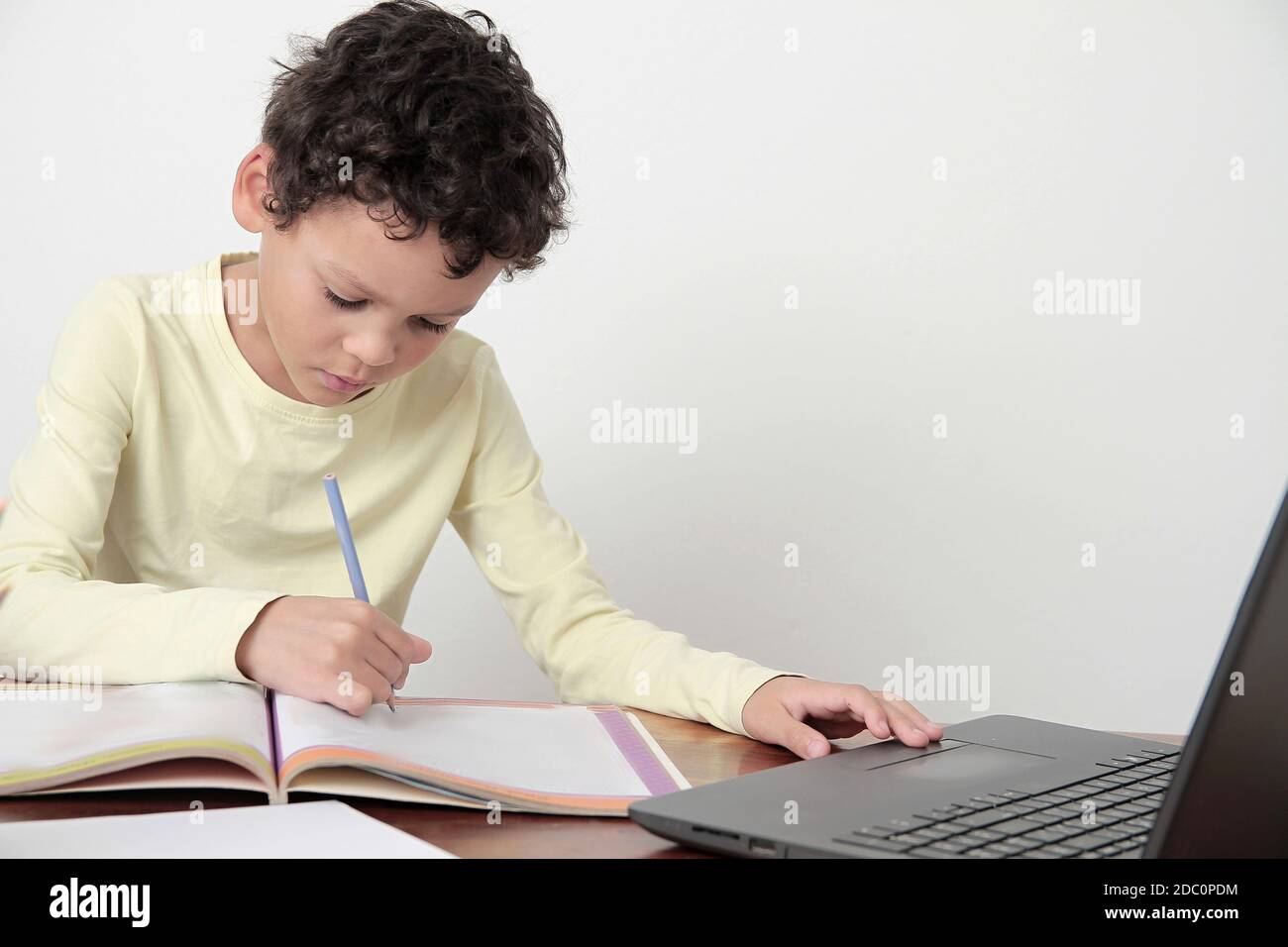 school boy learning at school educational distance learning stock photo ...