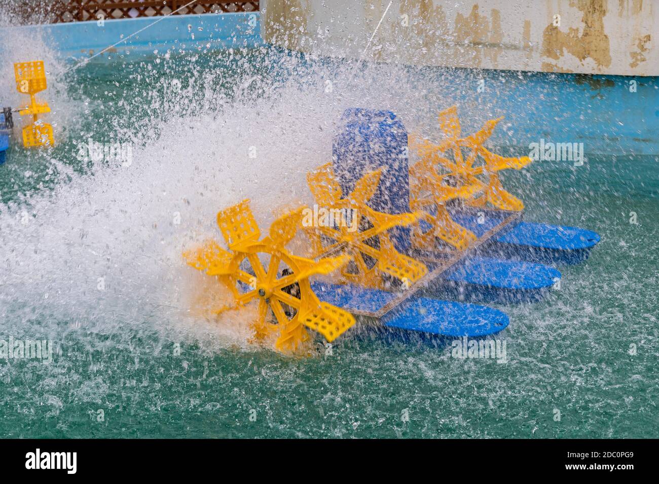 Spinning Paddle Wheels at Water in Aquaculture Pond Stock Photo - Alamy