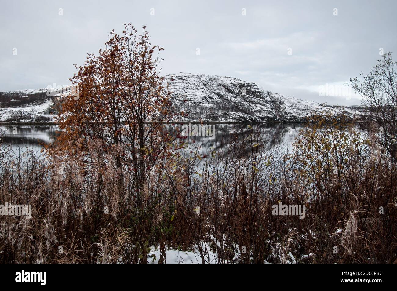 Reflex of mountains in the sea, Finmark landscape in October Stock ...