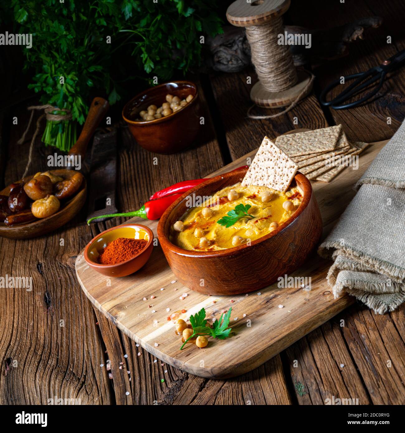 Delicious hummus paste with lemon and chilli Stock Photo - Alamy