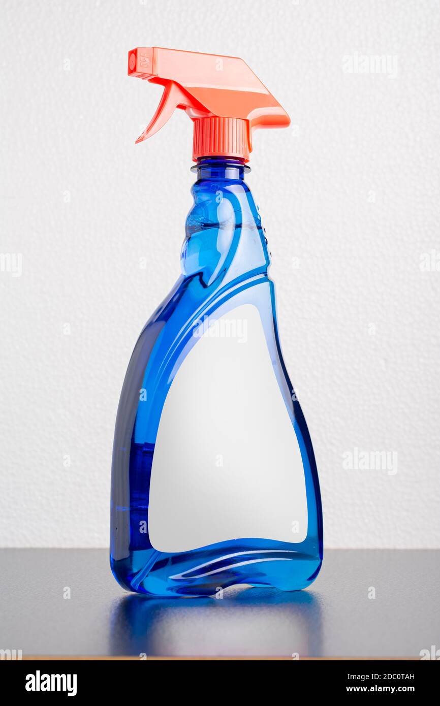 Cleaning liquid bottle in front of light gray background, editable mock ...