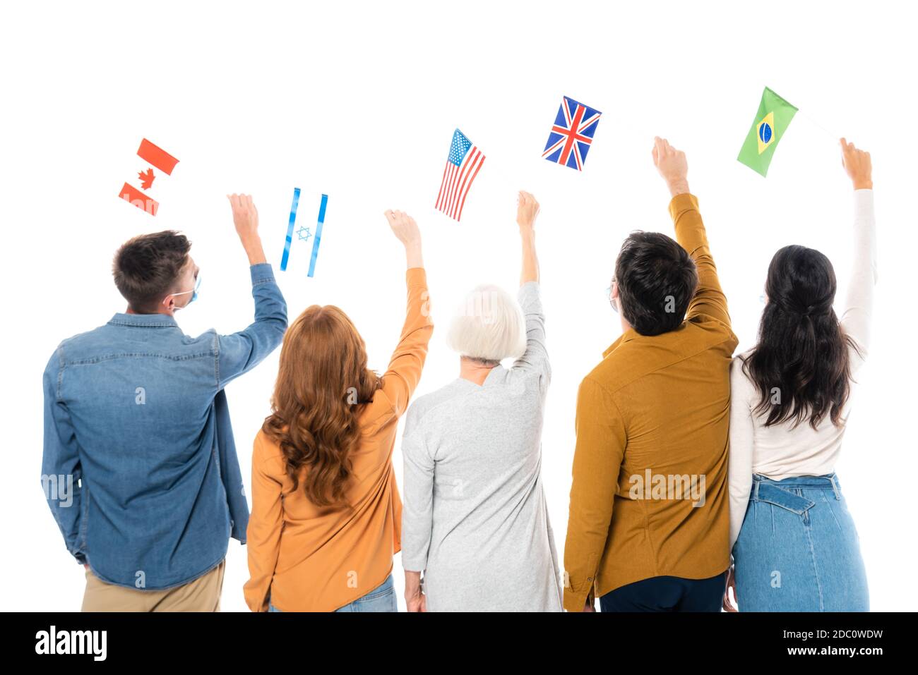 Back view of multiethnic people holding flags of counties isolated on ...