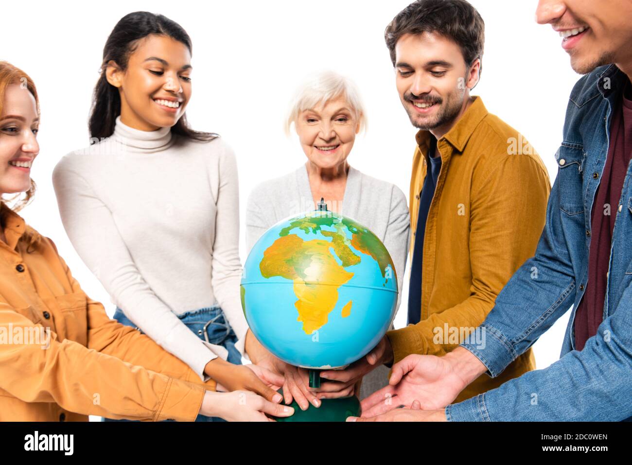 Smiling multicultural people holding globe isolated on white Stock ...