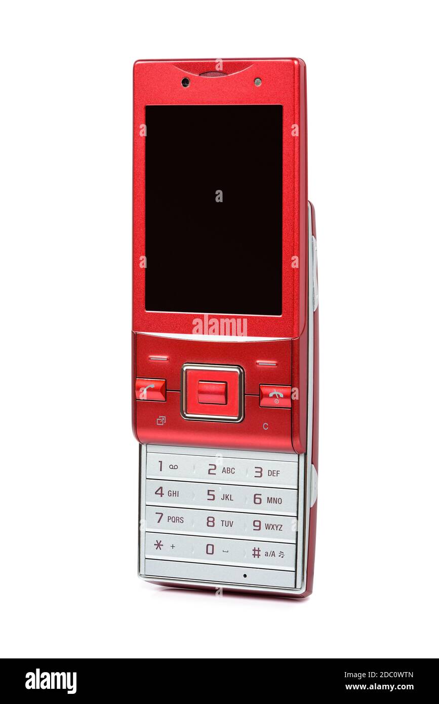 Red vintage slider phone isolated on white background with clipping ...