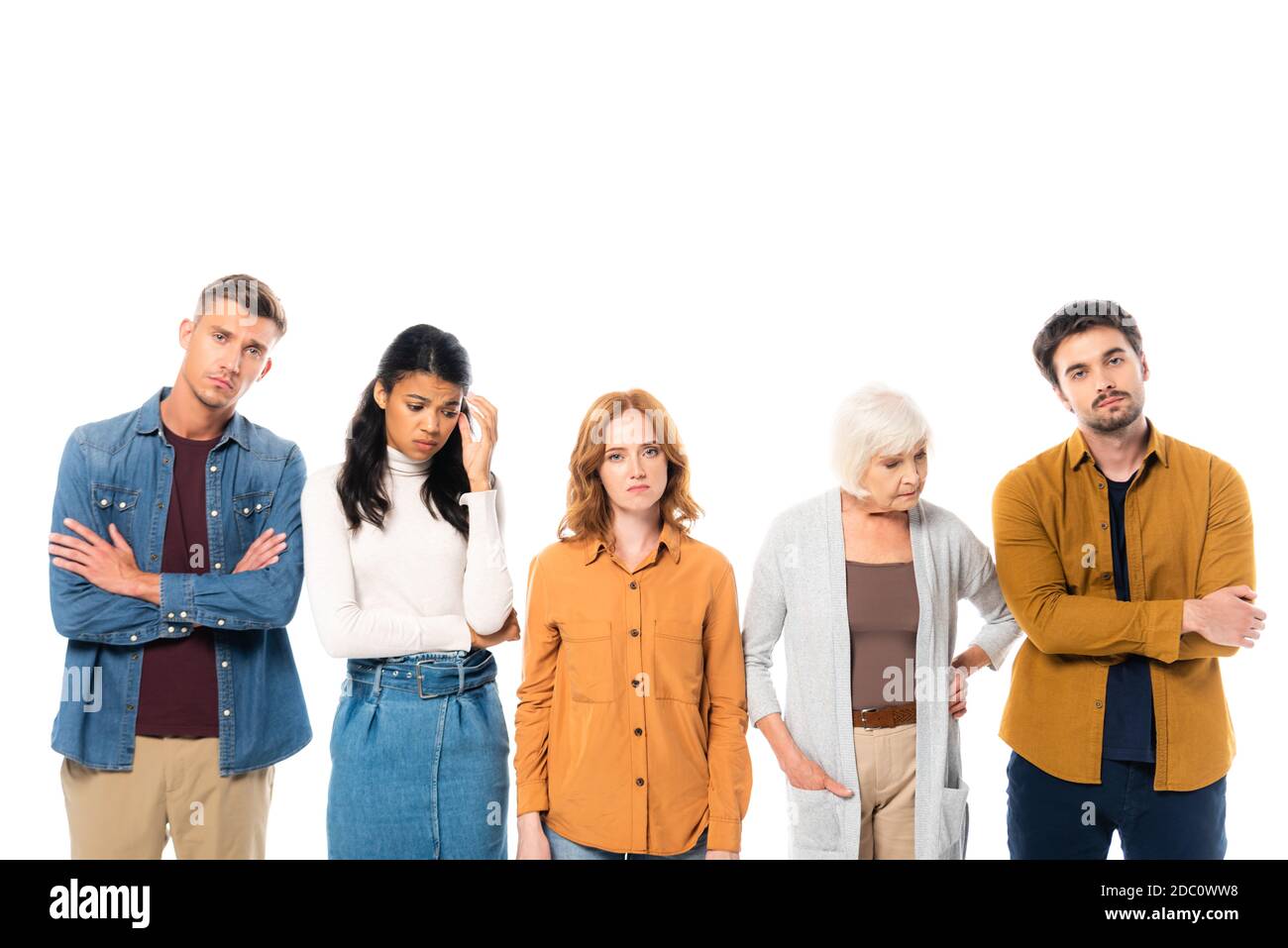 Upset and worried multicultural friends looking at camera isolated on ...