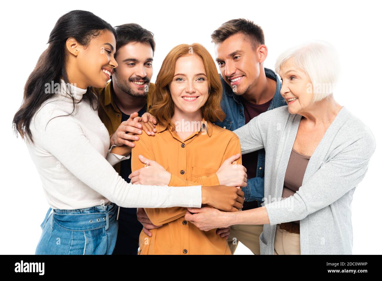 Multicultural friends embracing smiling woman isolated on white Stock ...