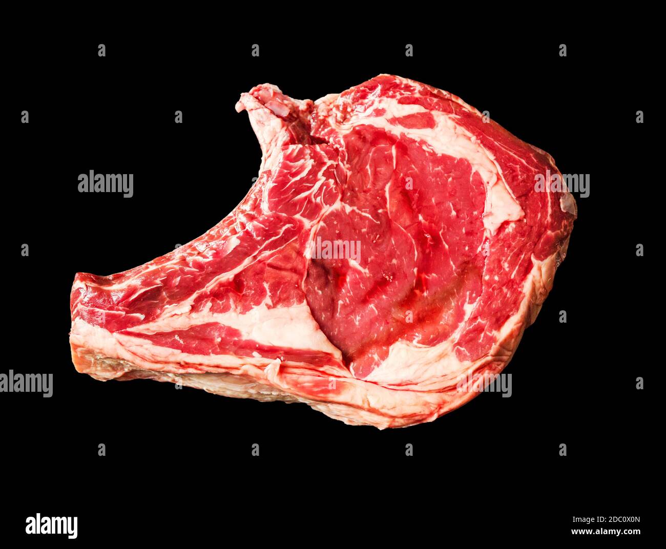 Raw beef prime rib isolated on black background. Top view Stock Photo ...