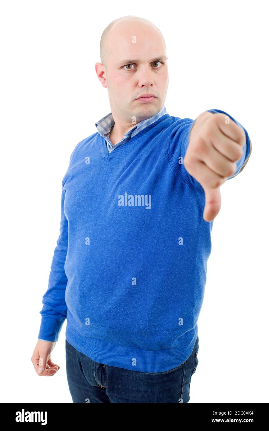 Casual man giving thumbs down, isolated on white background Stock Photo ...