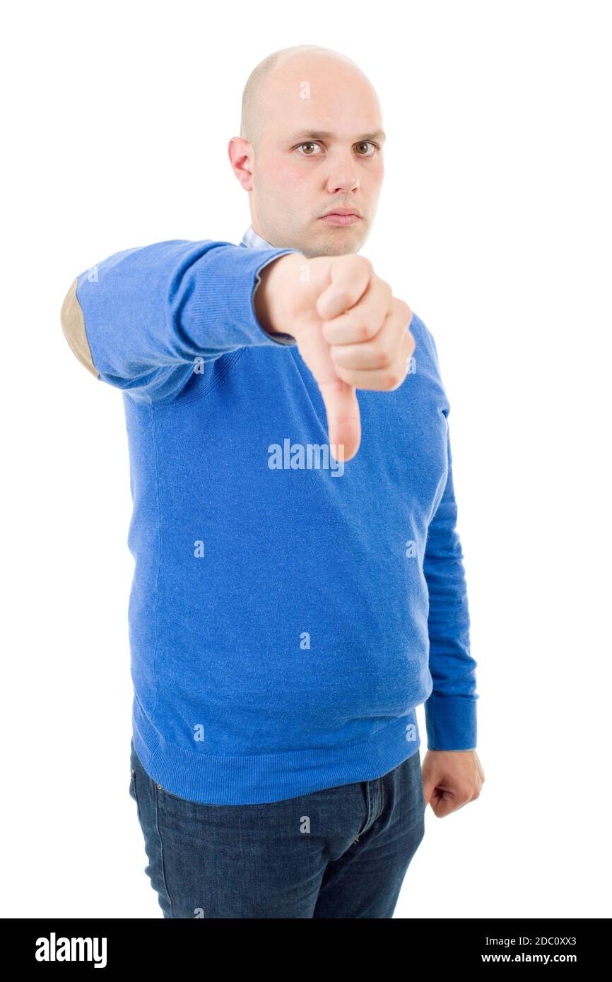 Casual man giving thumbs down, isolated on white background Stock Photo ...