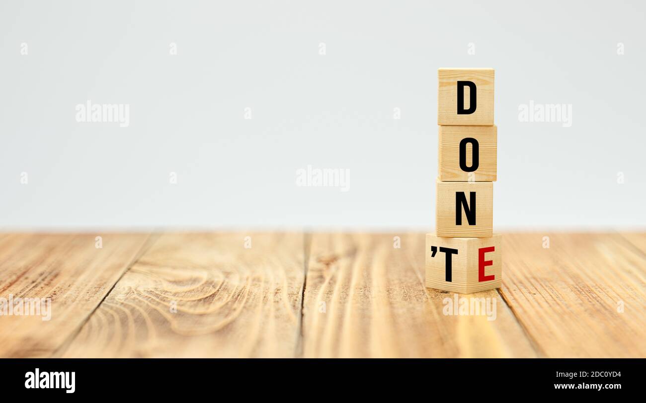 cubes with the words DON'T and DONE on white background - 3d ...