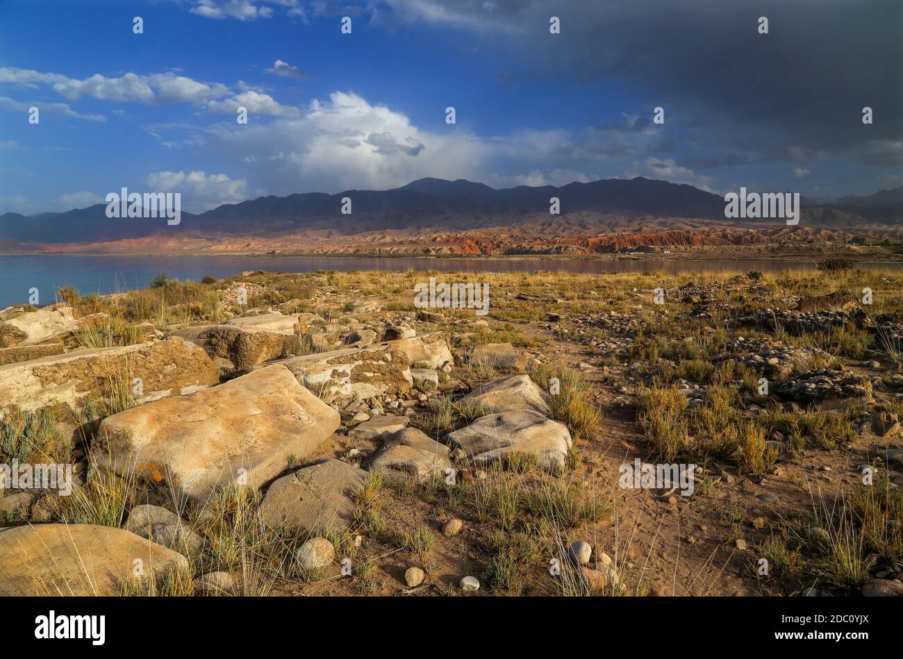 Issyk kul lake with mountains on background in Kyrgyzstan Stock Photo ...