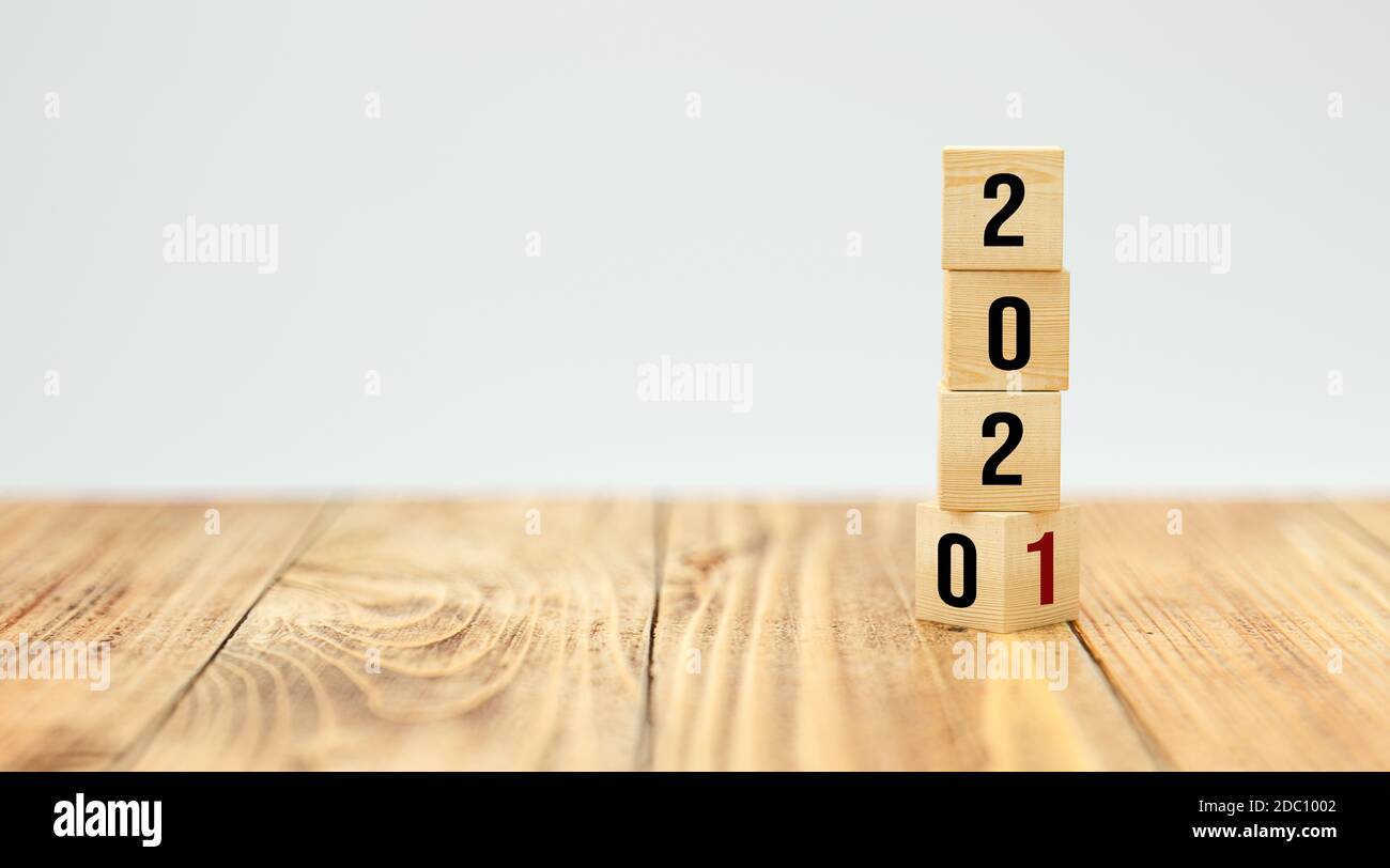 cubes turning from year 2020 to 2021 on white background - 3d ...