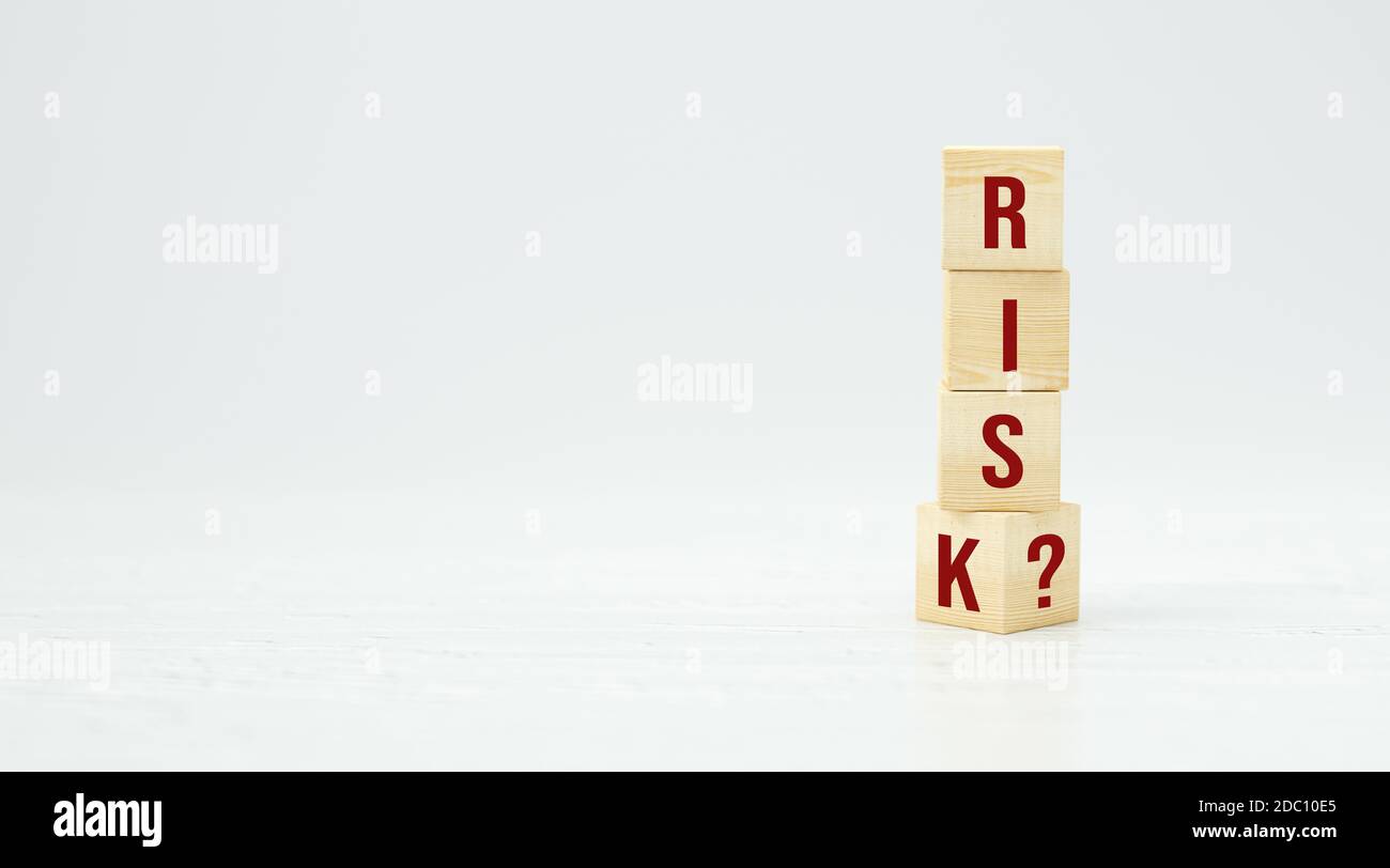 stacked cubes with message RISK? on white background - 3d illustration ...
