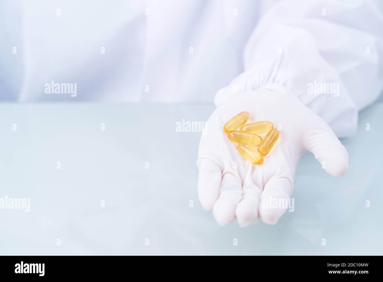 Close up Scientist hands putting in nitrile latex gloves holding Omega ...