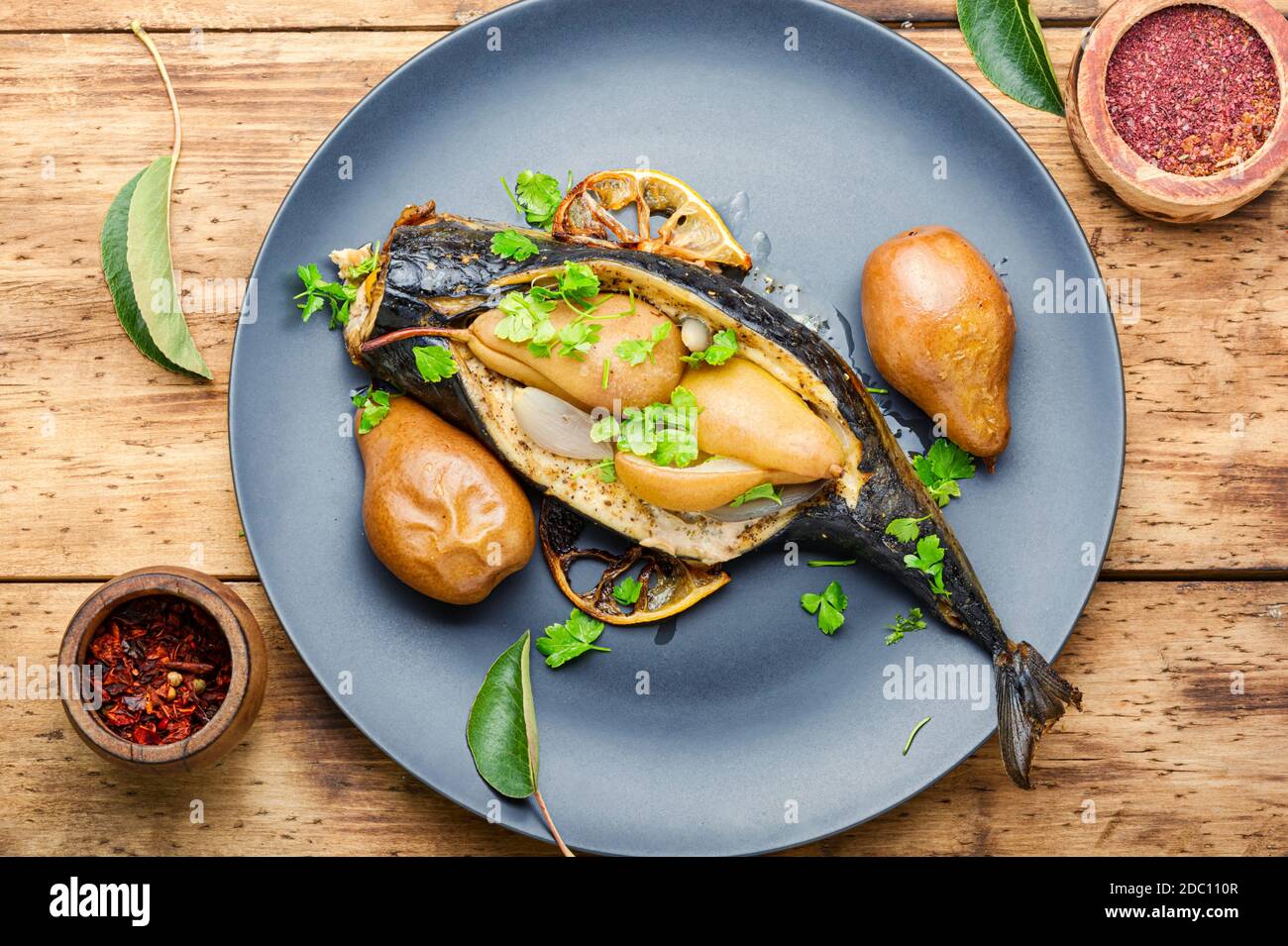 Baked mackerel fish stuffed with autumn pear.Grilled mackerel with ...