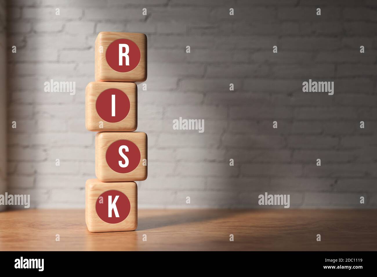 wooden cubes with the word RISK in front of a brick wall - 3d ...