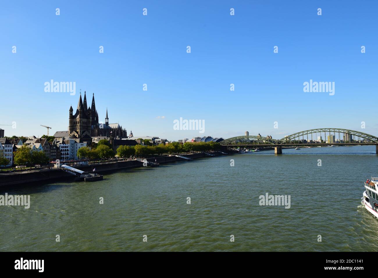 Cologne Cathedral and Hohenzollern Bridge in Cologne, Germany Stock ...