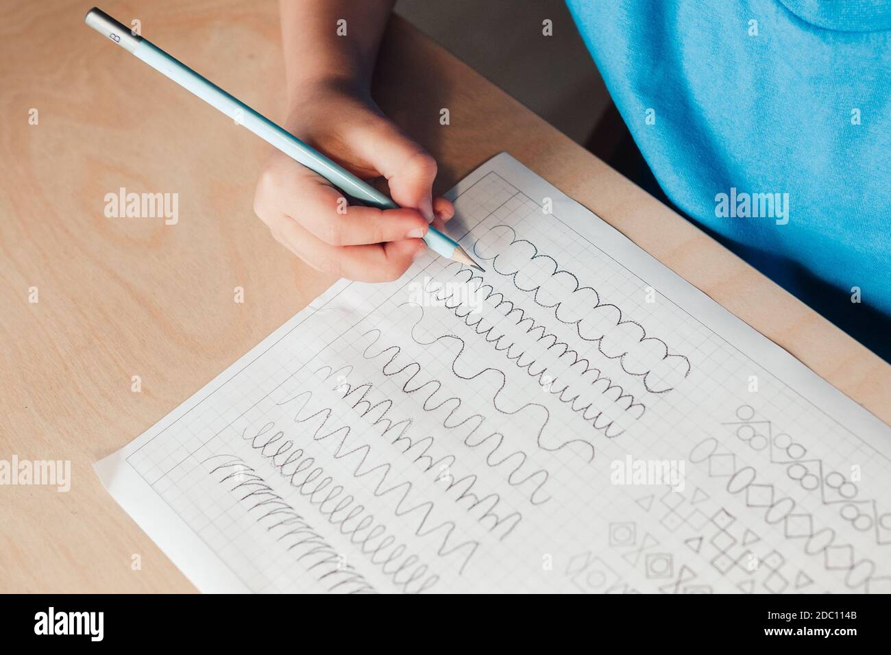 Schoolkid writing hi-res stock photography and images - Alamy