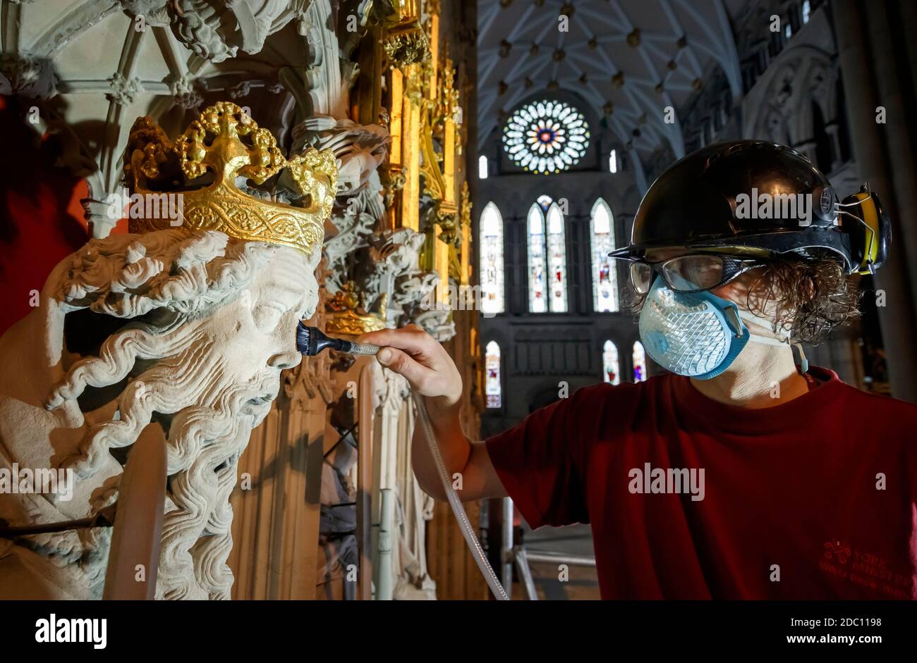 Lead Mason Conservator Lee Godfrey workers using museum grade vacuums ...