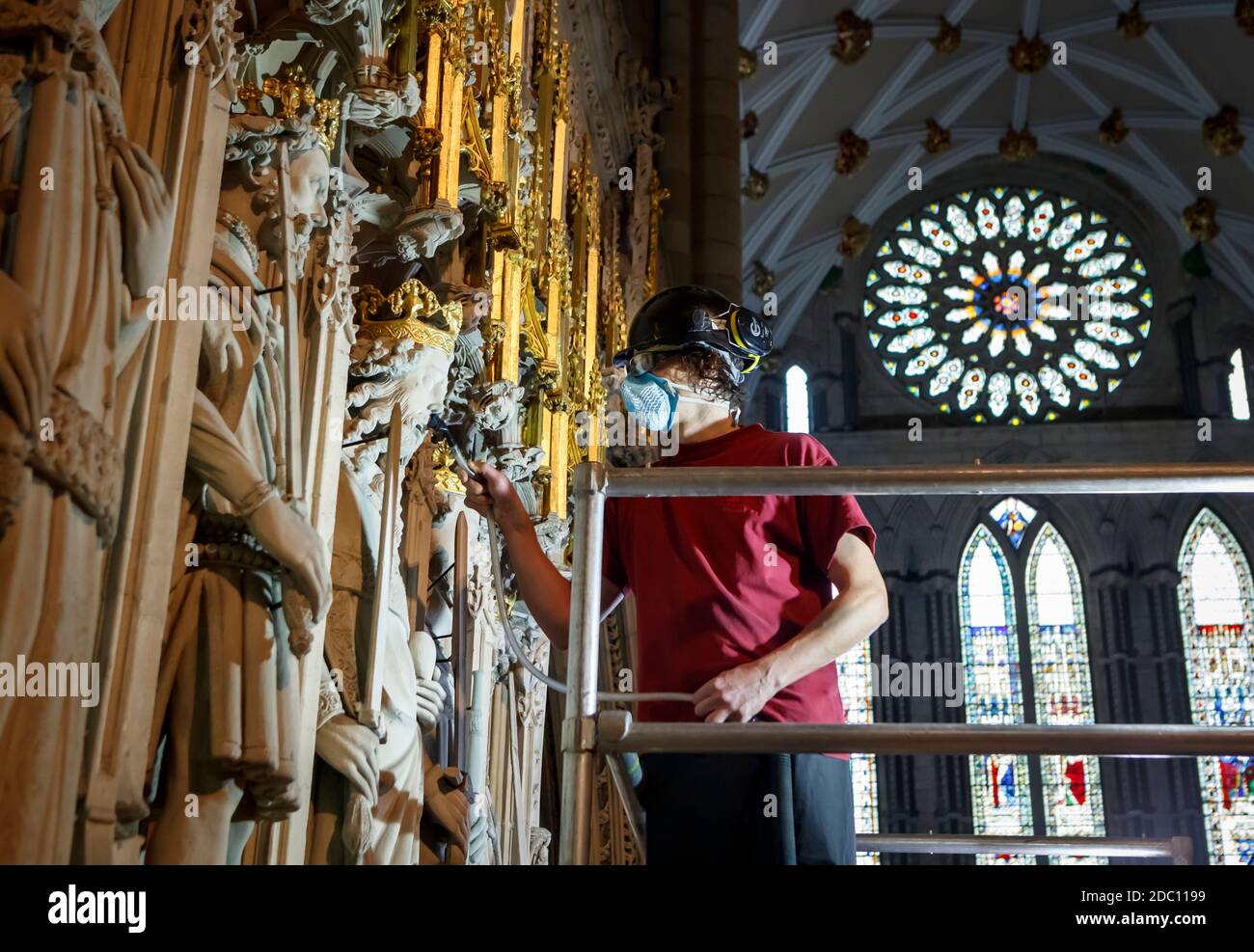 Lead Mason Conservator Lee Godfrey workers using museum grade vacuums ...