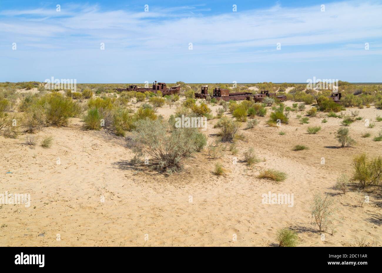 boats on a ship graveyard on a desert around Moynaq, Moynoq or Muynak ...